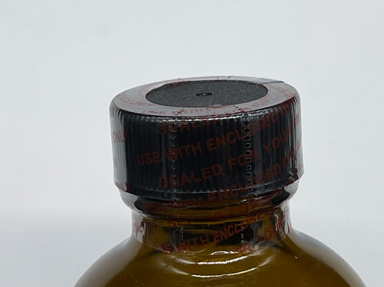 Perforations in Tamper Evident Neck Bands and Shrink Sleeve Labels